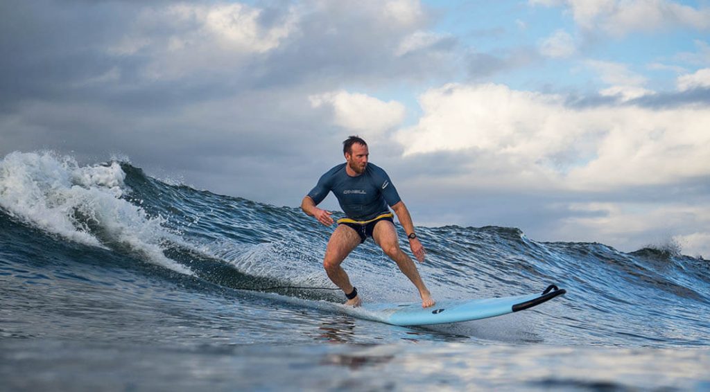 The Health Benefits of Surfing- Physical, Mental, & Spiritual
